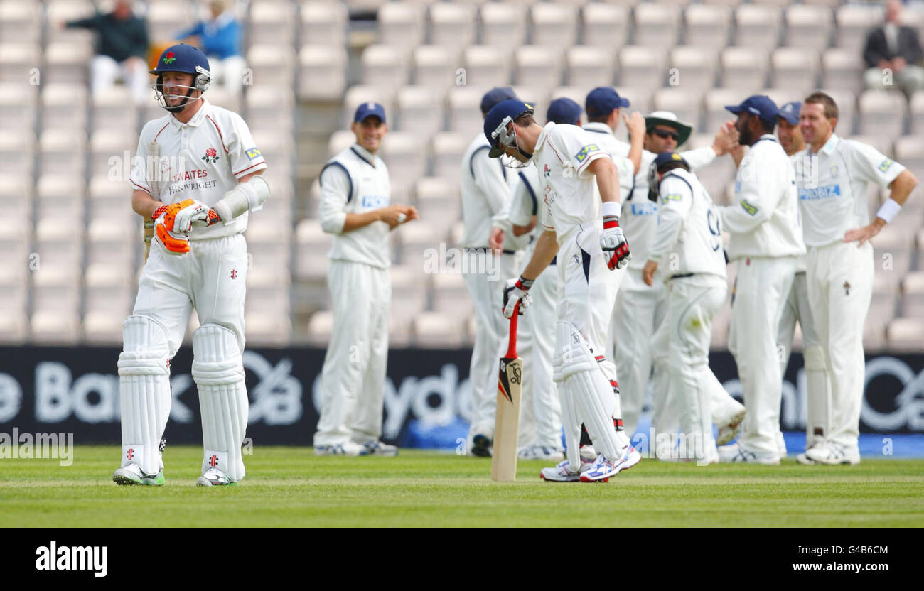 Hampshire bowler Dominic Cork (far right) celebrates with team-mates ...