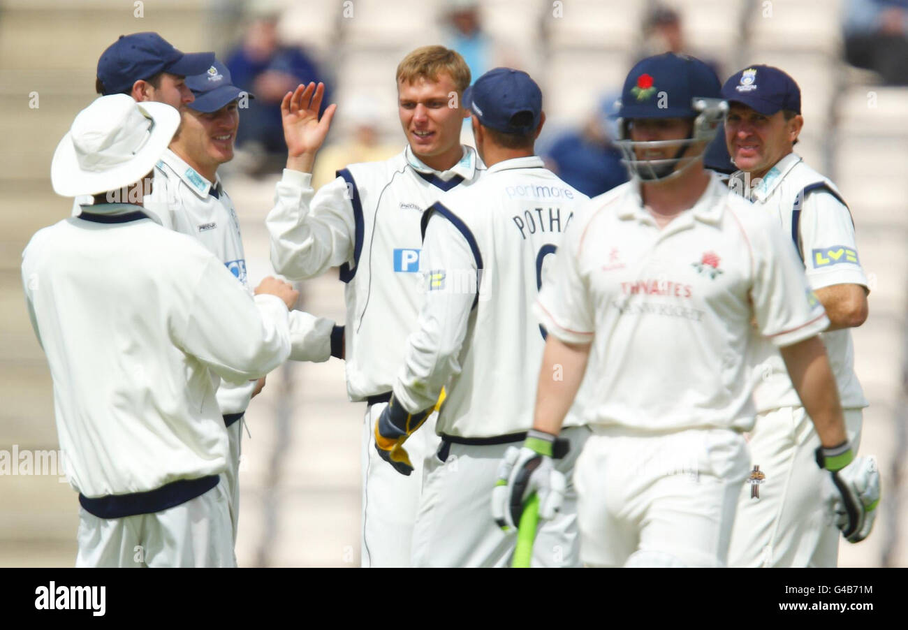 Hampshire spin bowler Danny Briggs (centre, facing) celebrates with ...