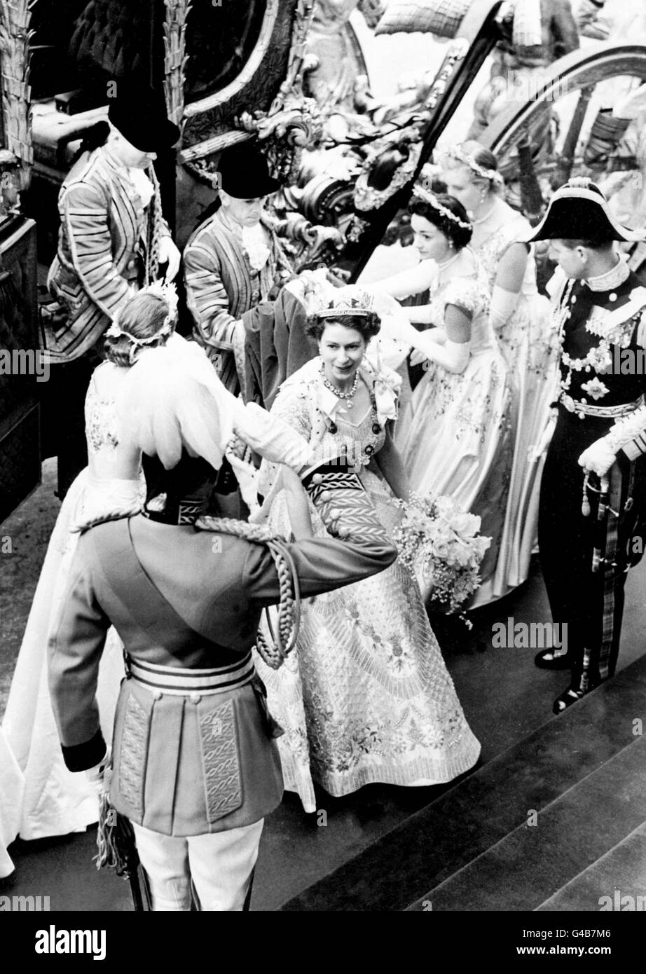 Queen Elizabeth II, attended by her Maids of Honour, leaves her State ...