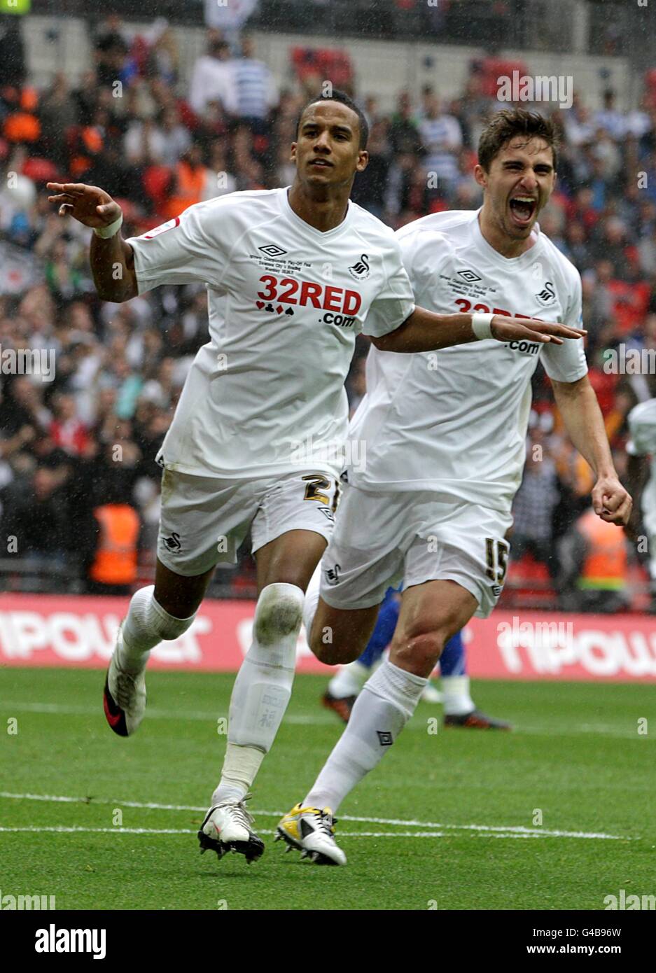 Swansea City's Scott Sinclair (left) celebrates his hat-trick and ...