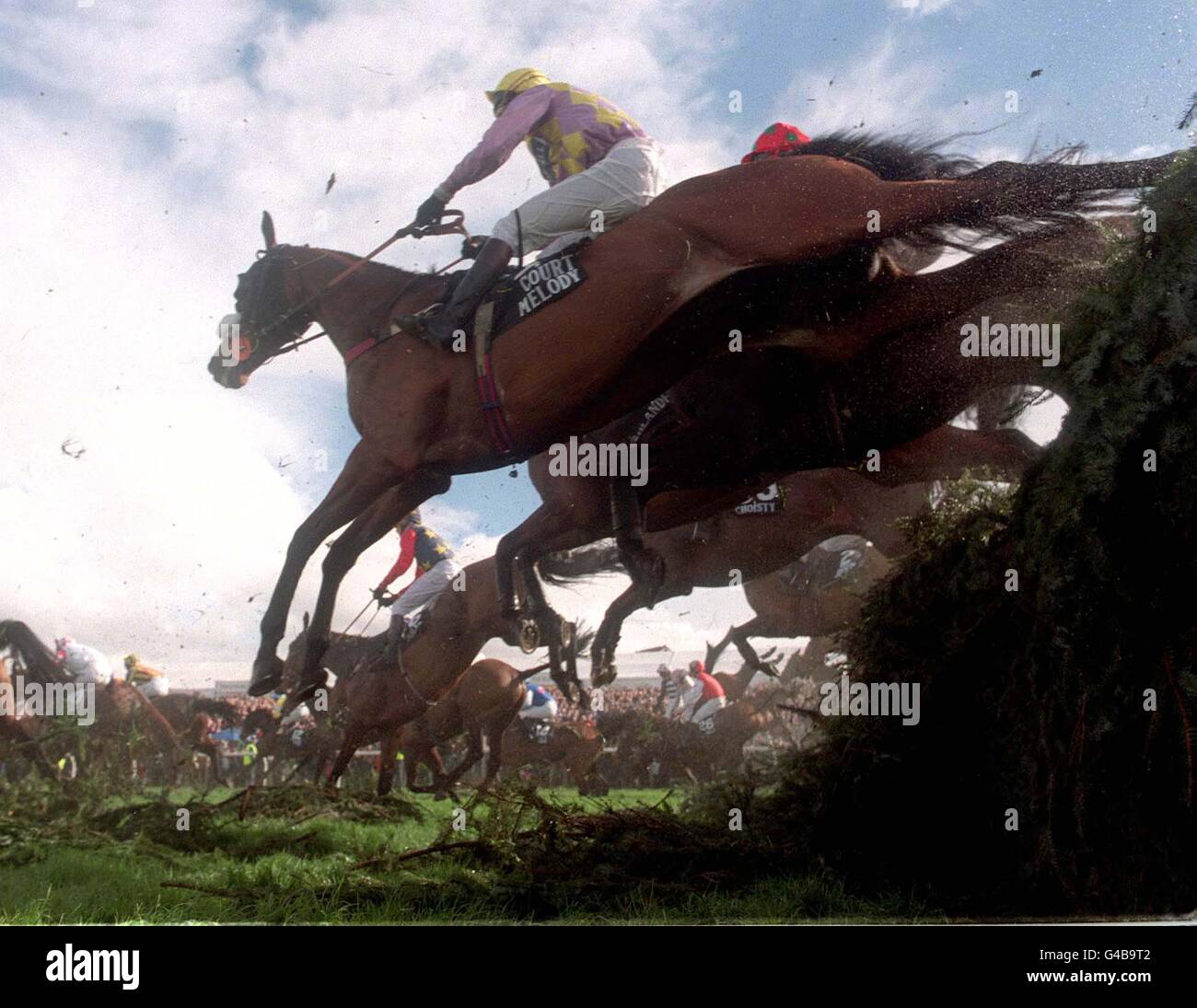 Mighty leaps from runners in the Grand National at Aintree today ...