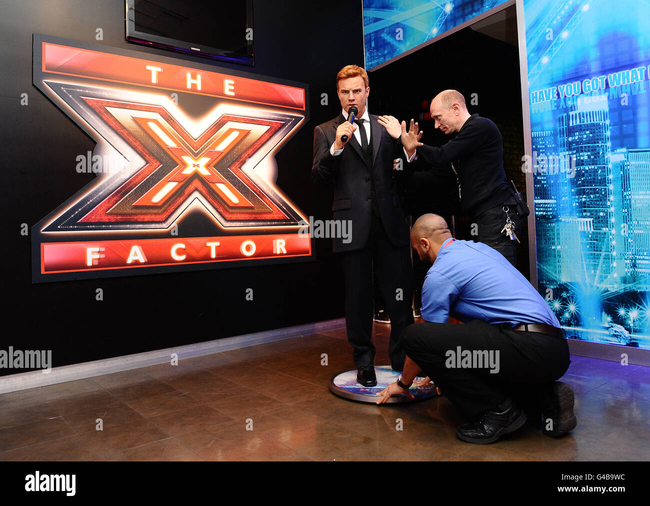 The wax figure of UK X-Factor judge Gary Barlow prepares to welcome wannabe pop stars into the ...