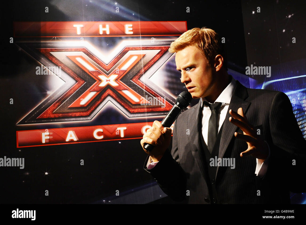 The wax figure of UK X-Factor judge Gary Barlow prepares to welcome wannabe pop stars into the ...