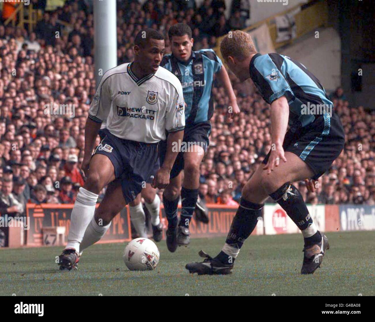 Tottenham Hotspur's Les Ferdinand and Coventry City's David Burrows in ...