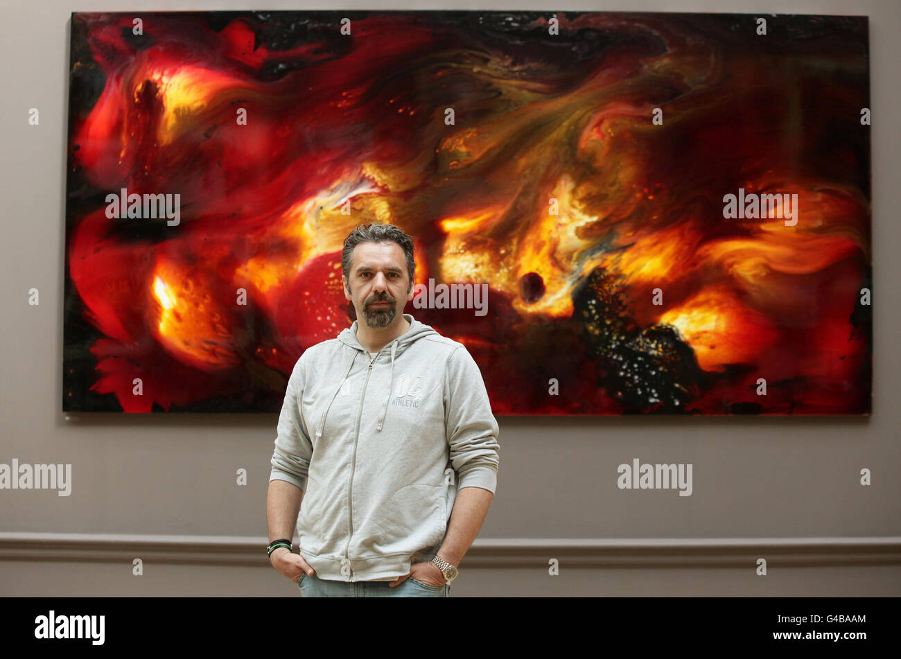 Artist Keith Tyson stands in front of his artwork 'Deep Impact' during ...