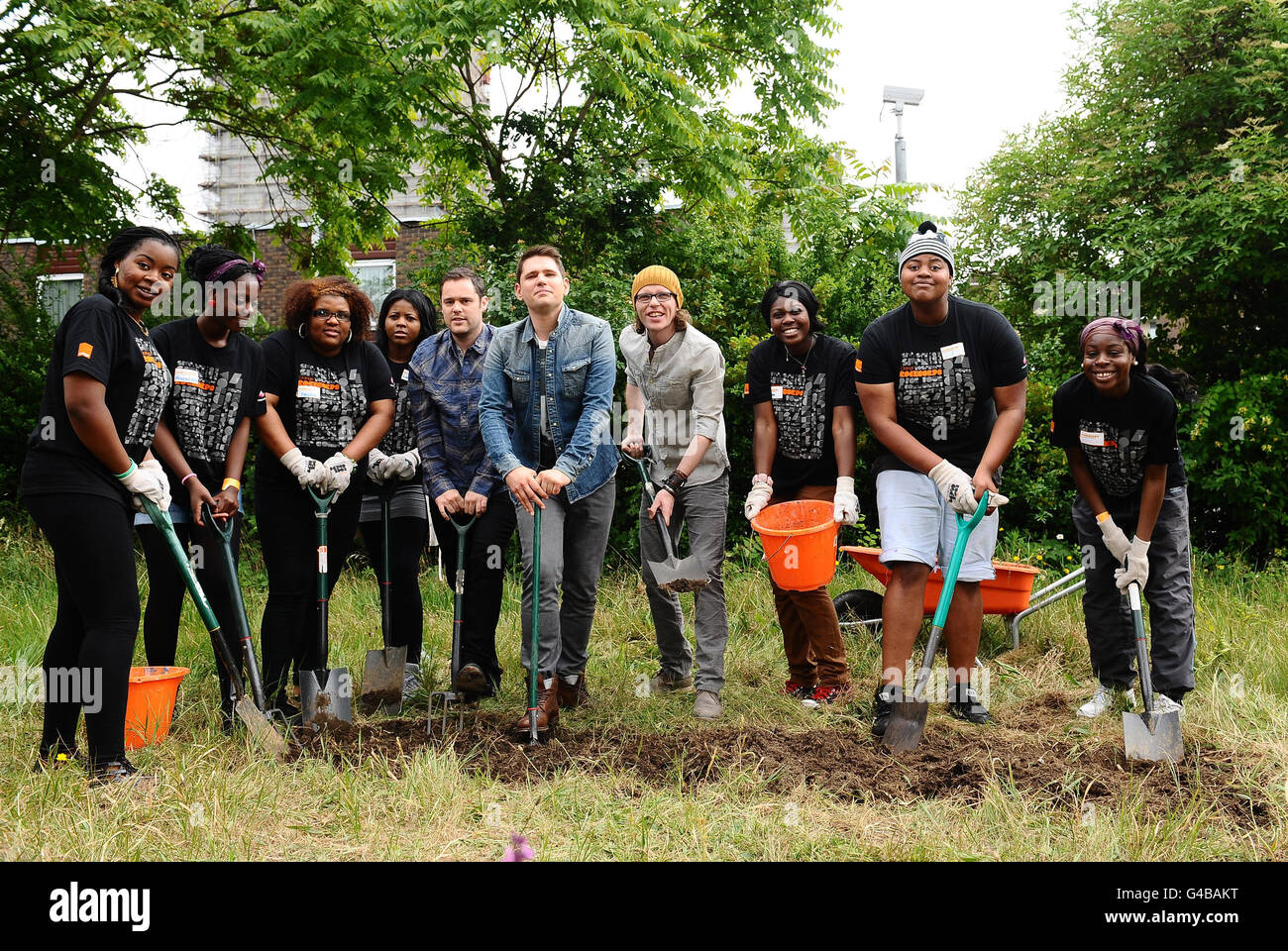 Members of Scouting For Girls, (centre, left to right) Peter Ellard ...