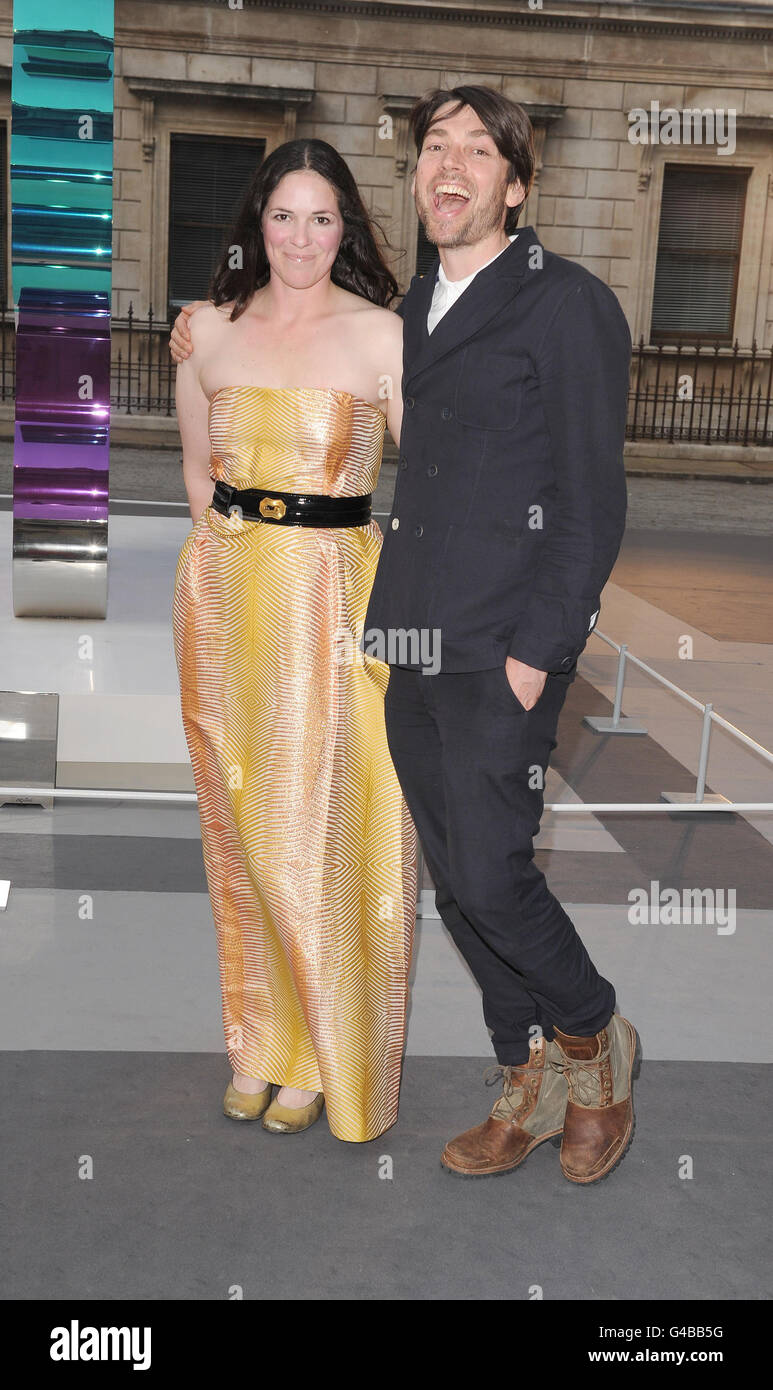 Alex James and his wife Claire arrives at the Royal Academy of Arts ...