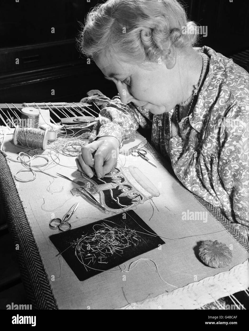 Ruby Essan working on the crown for the Coronation robe at the Royal ...