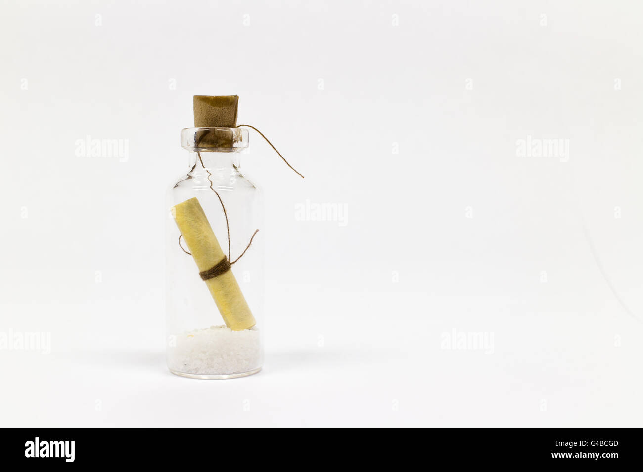 Message in bottle isolated on white background Stock Photo - Alamy