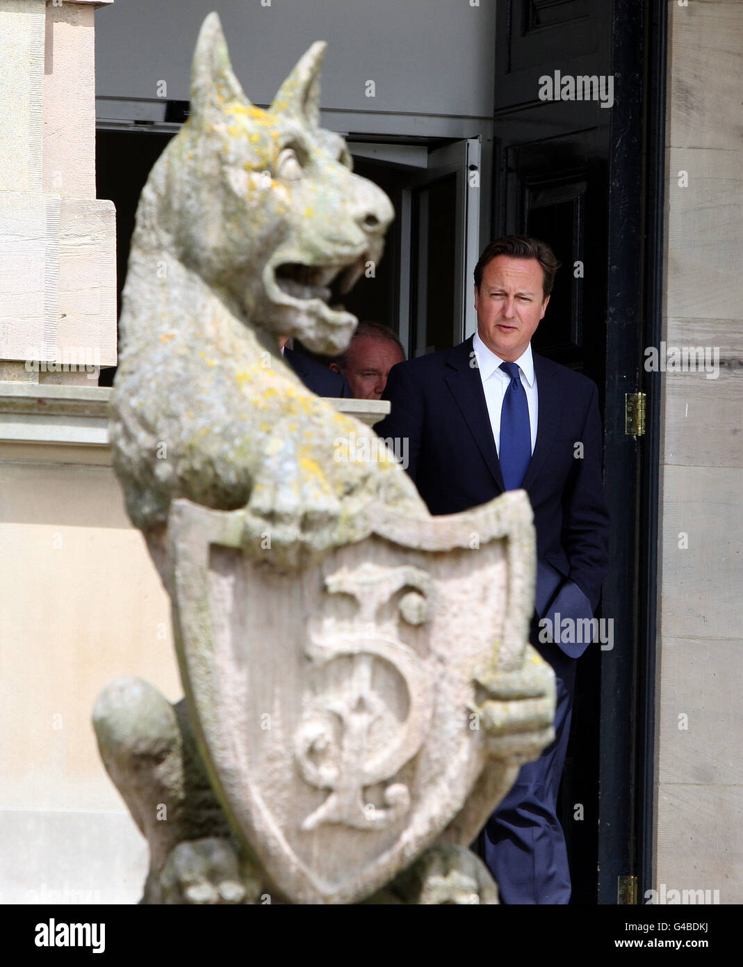 Prime Minister David Cameron leaves Stormont Castle in Belfast, after ...