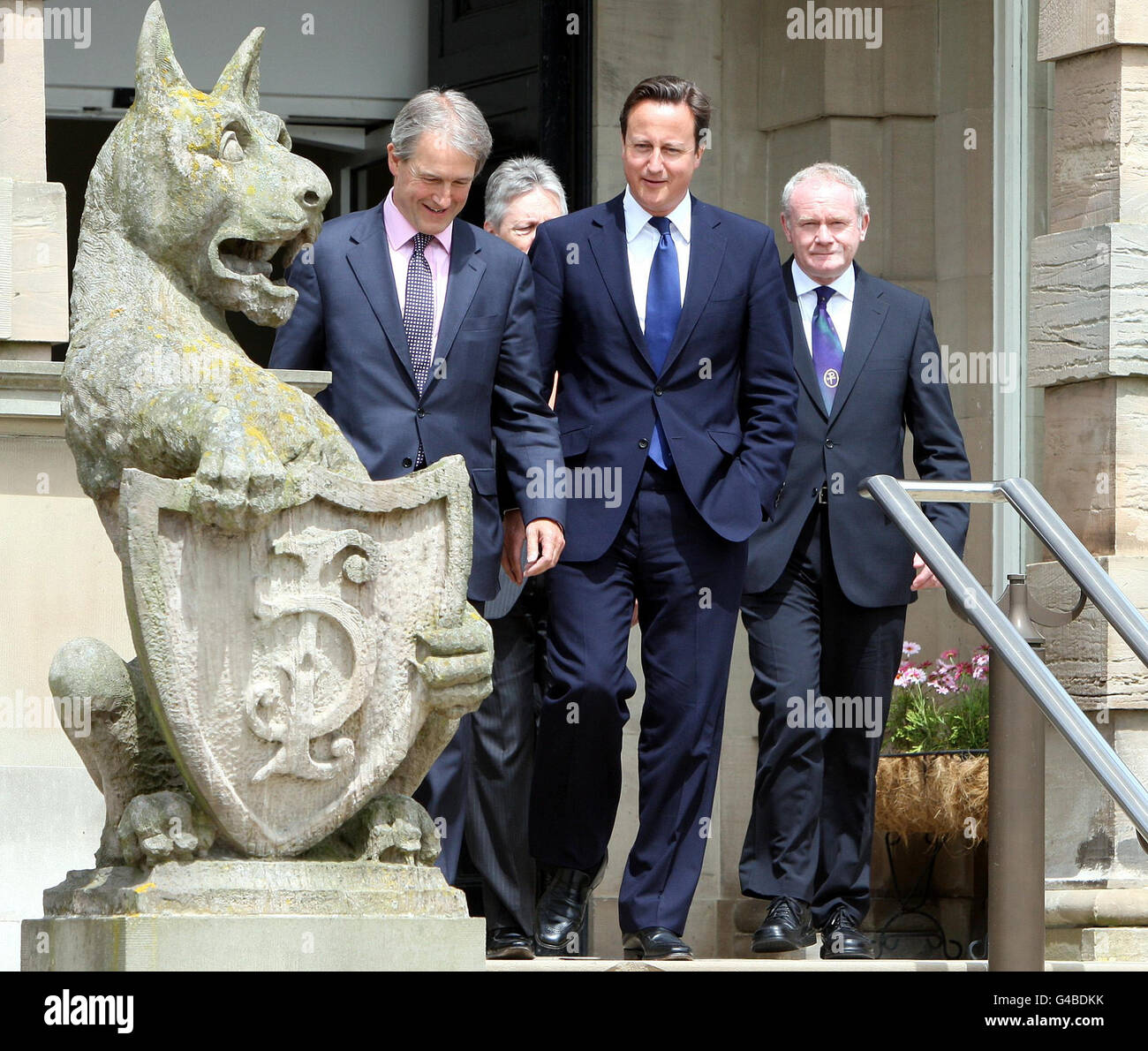 Prime Minister David Cameron leaves Stormont Castle in Belfast, with ...