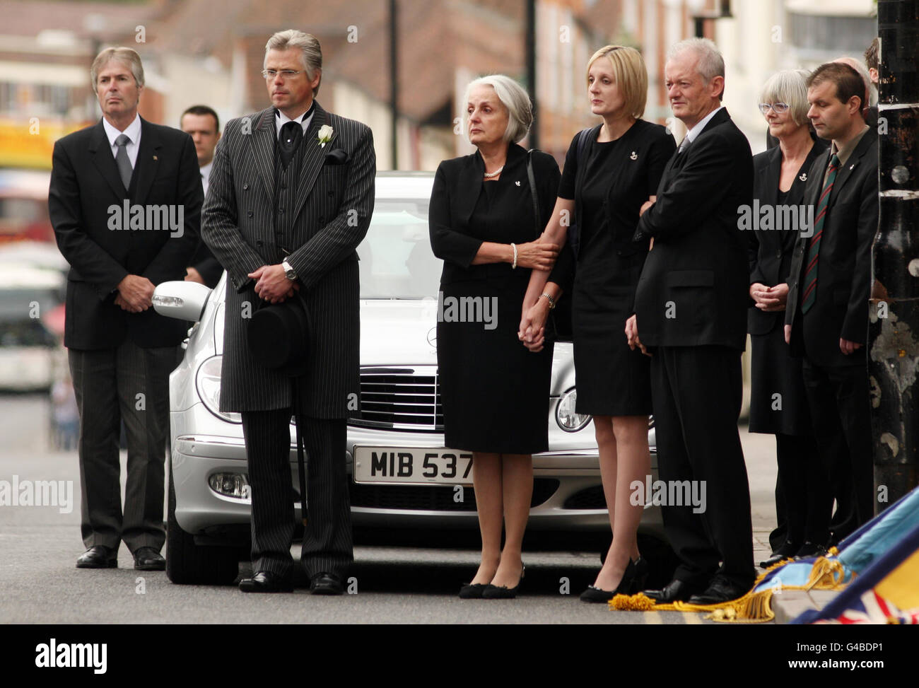 Wife Nia ands mother Sue of Colour Serjeant Kevin Fortuna look on as ...