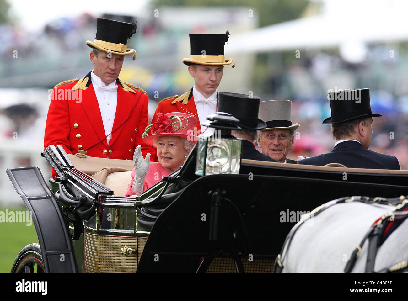 The royal procession as Queen Elizabeth II and the Duke Of Edinburgh ...