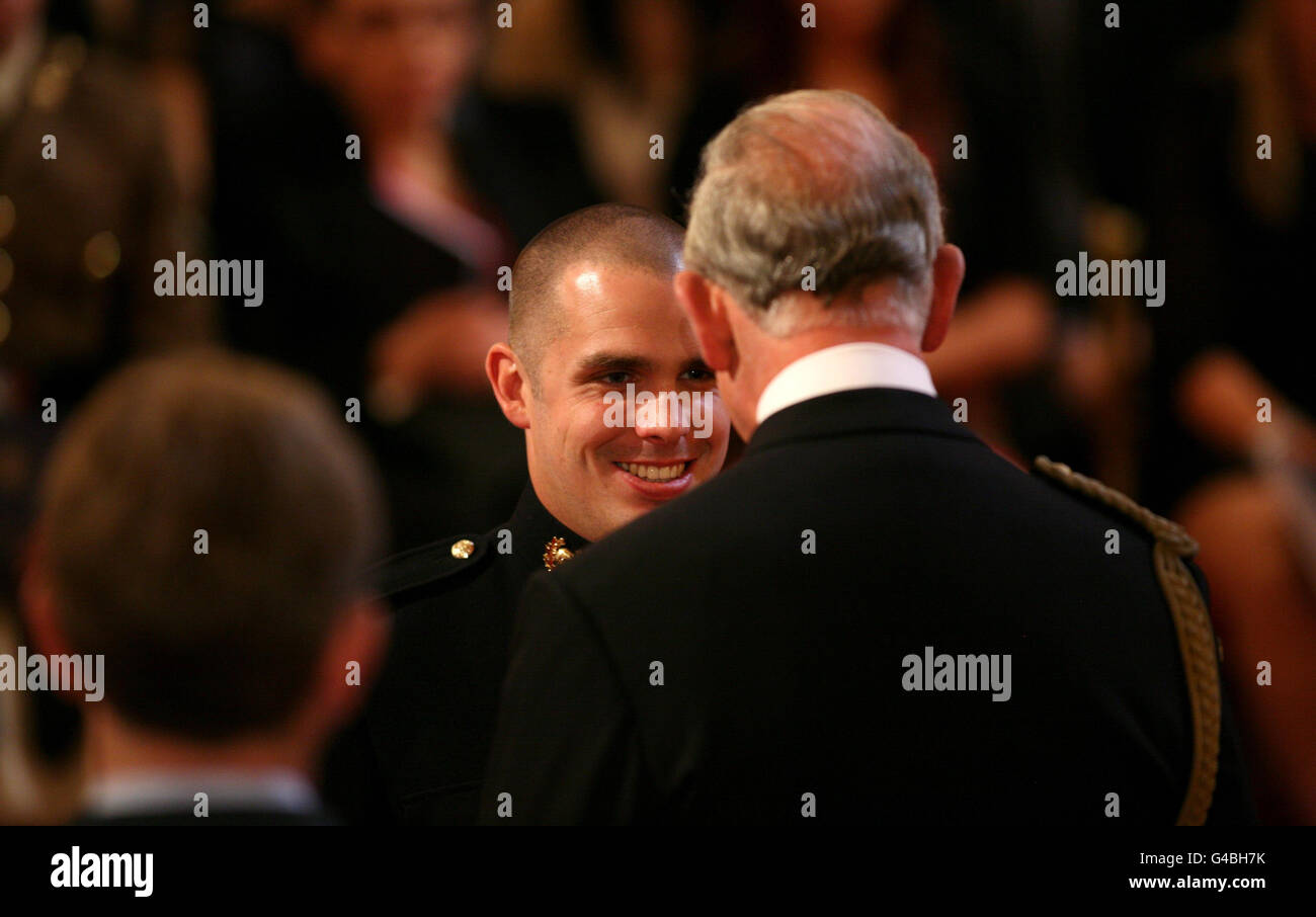 Lance Corporal Ryan Shelley, Royal Marines, is decorated with the ...