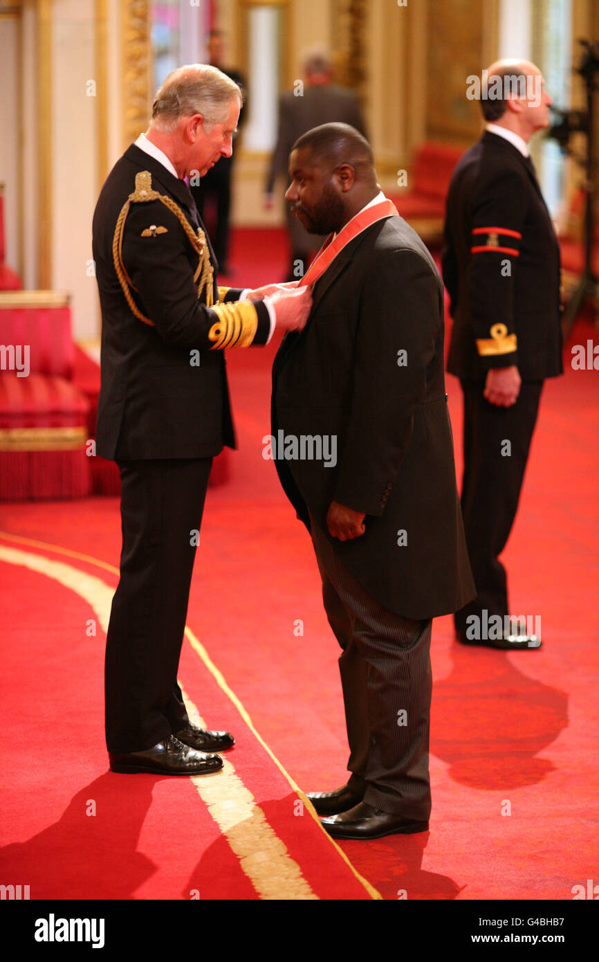 Steve McQueen is presented with his CBE by the Prince of Wales, at the ...