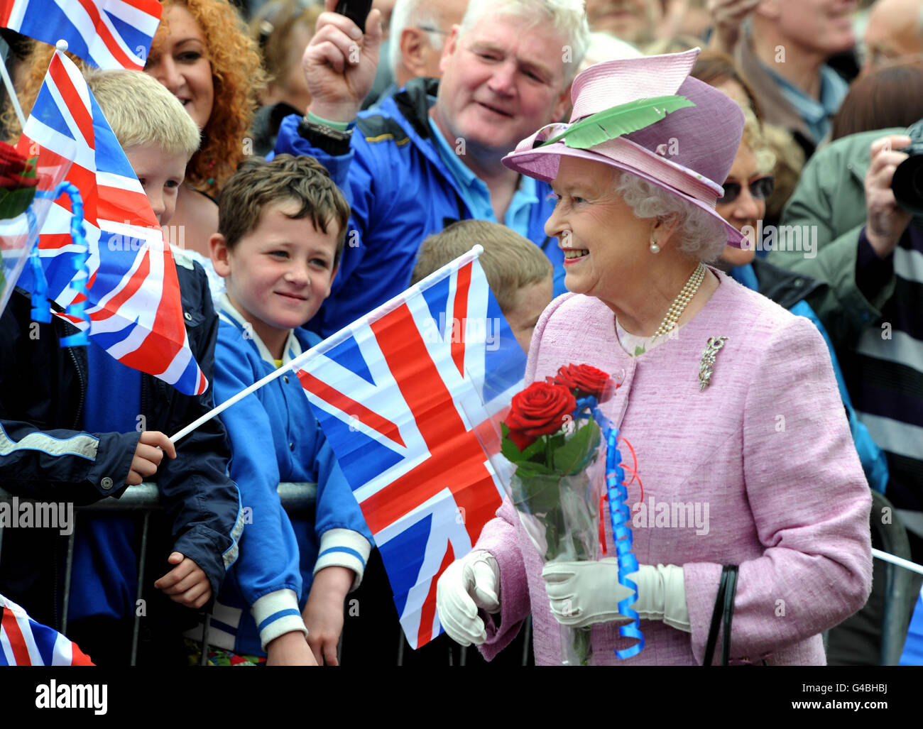 Queen Elizabeth II as cheering crowds lined the centre of Alnwick ...