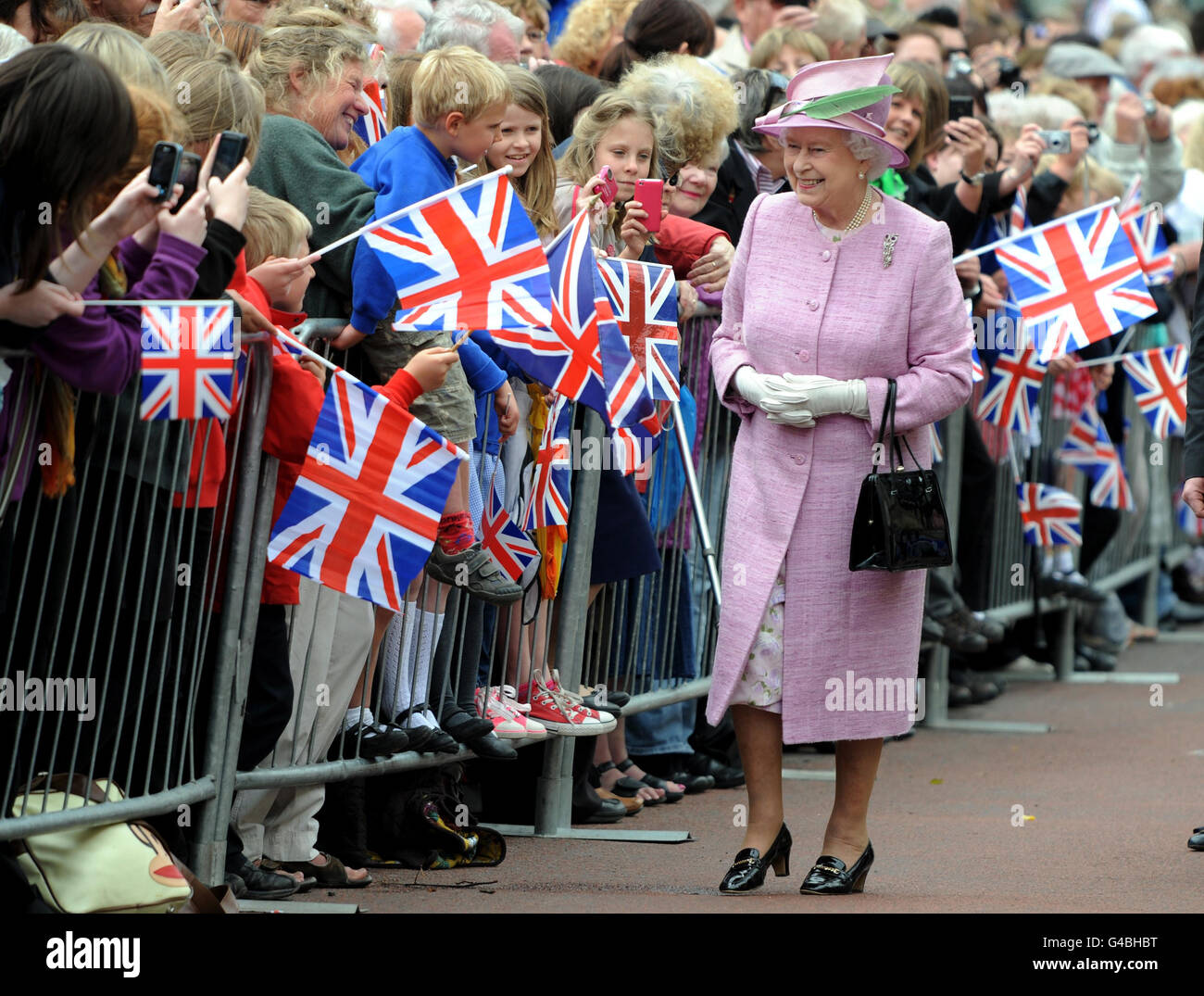 Queen Elizabeth II as cheering crowds lined the centre of Alnwick ...