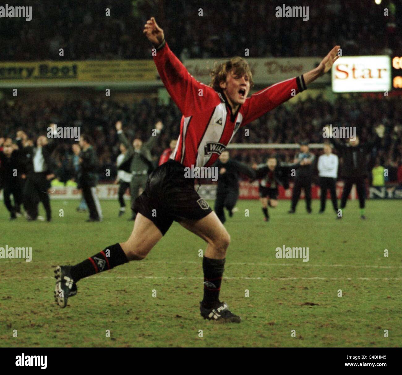Sheffield United's penalty scorer Wayne Quinn celebrates as Sheffield ...