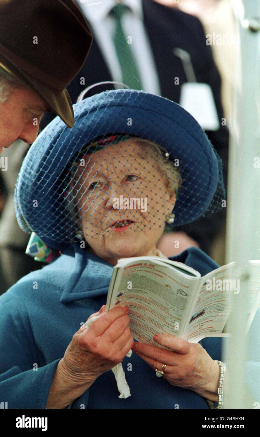 Queen Elizabeth, The Queen Mother discusses the race card at Cheltenham ...