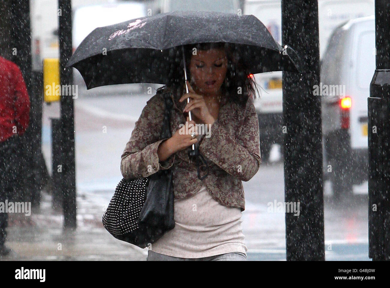 Woman Caught In The Rain Caught In The Rain – Blog #2