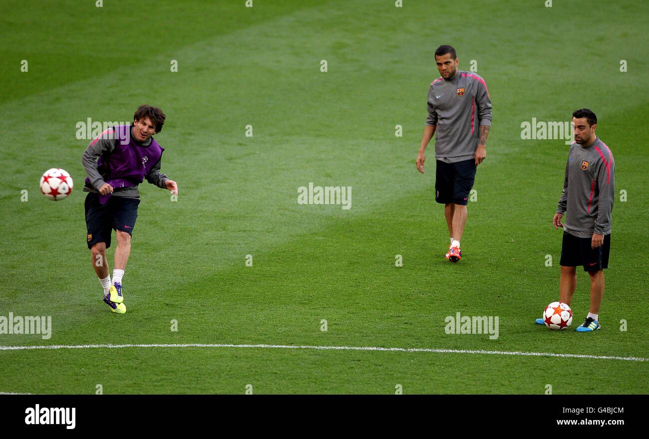 Barcelonas lionel messi left and xavi hernandez in training hi-res ...