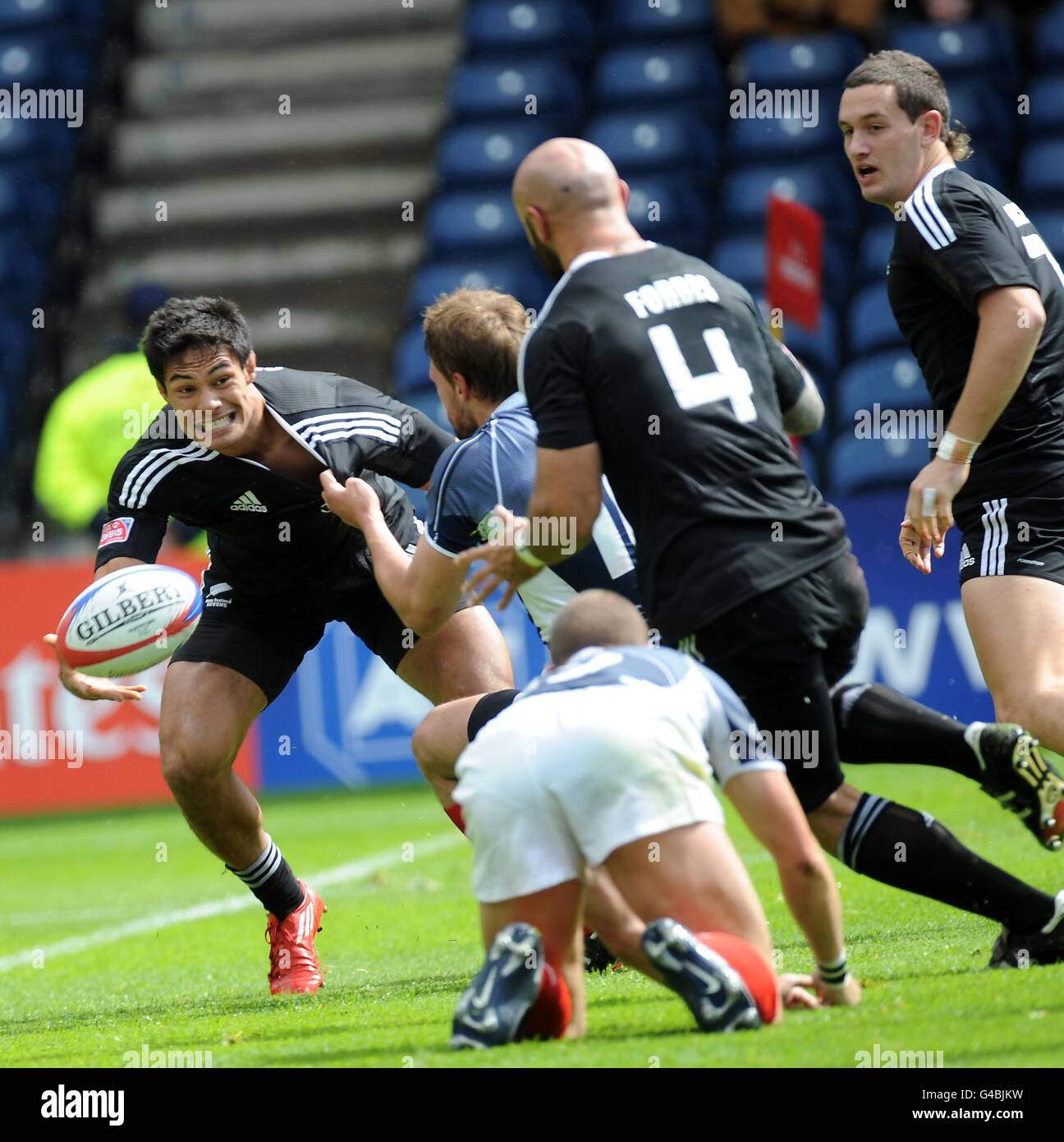 New Zealand's Rory Grice is tackled by Russia's Nikolay Zavozin Stock ...
