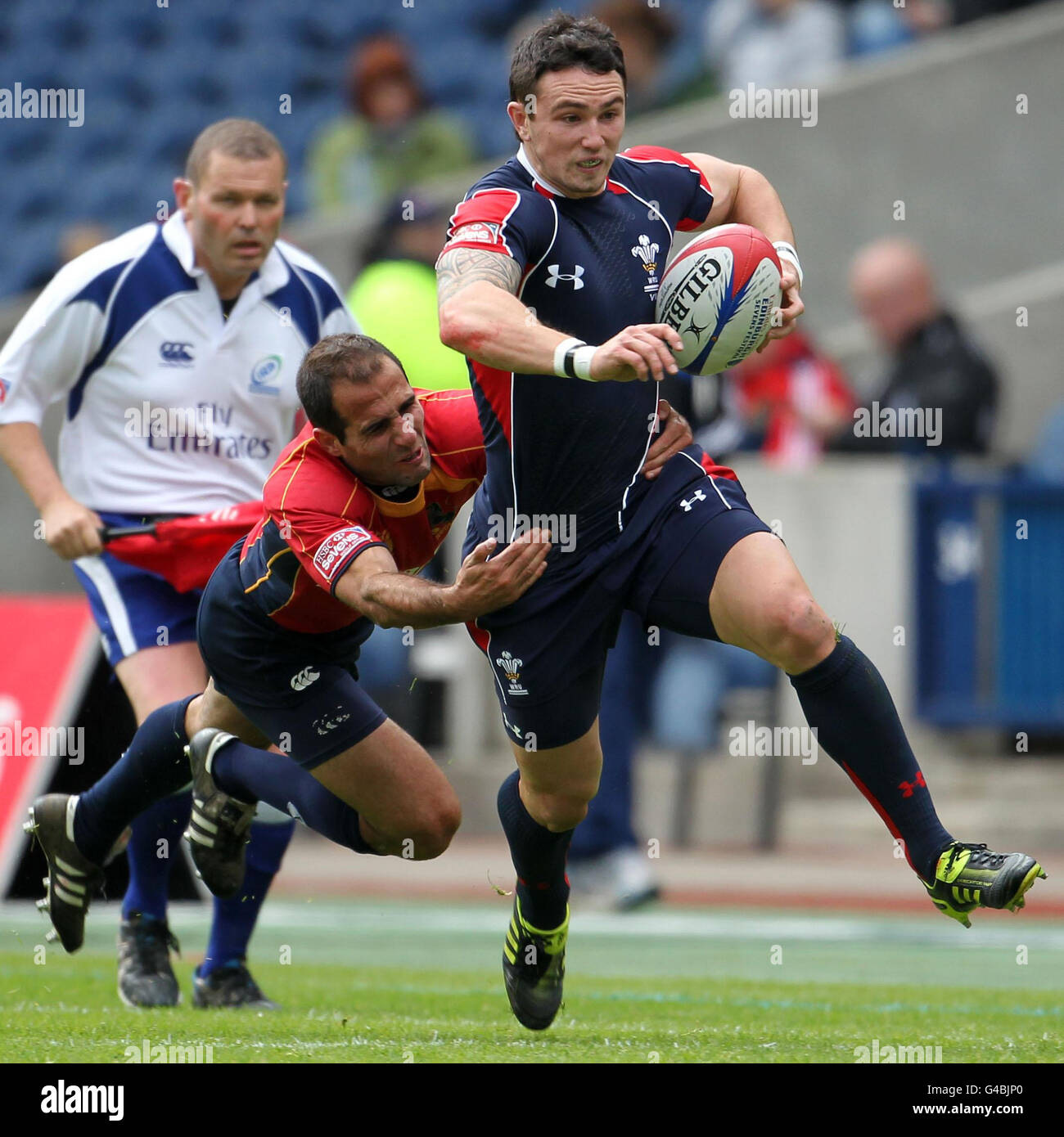 Spains Javier Carrion (left) challenges Wales' Richard Pugh during the ...