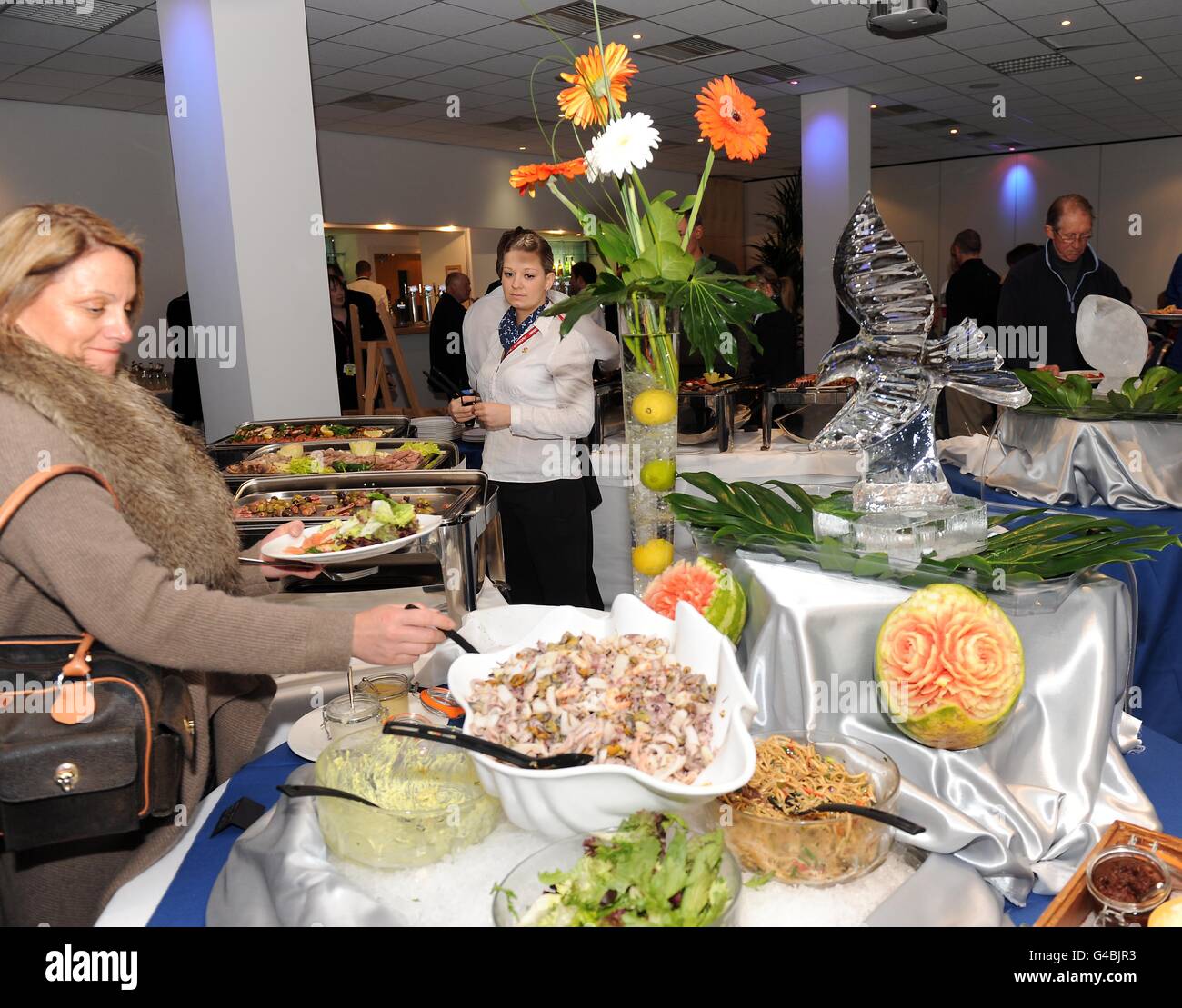 Food is prepared in the Presidential Suite during the Emirates Airline ...