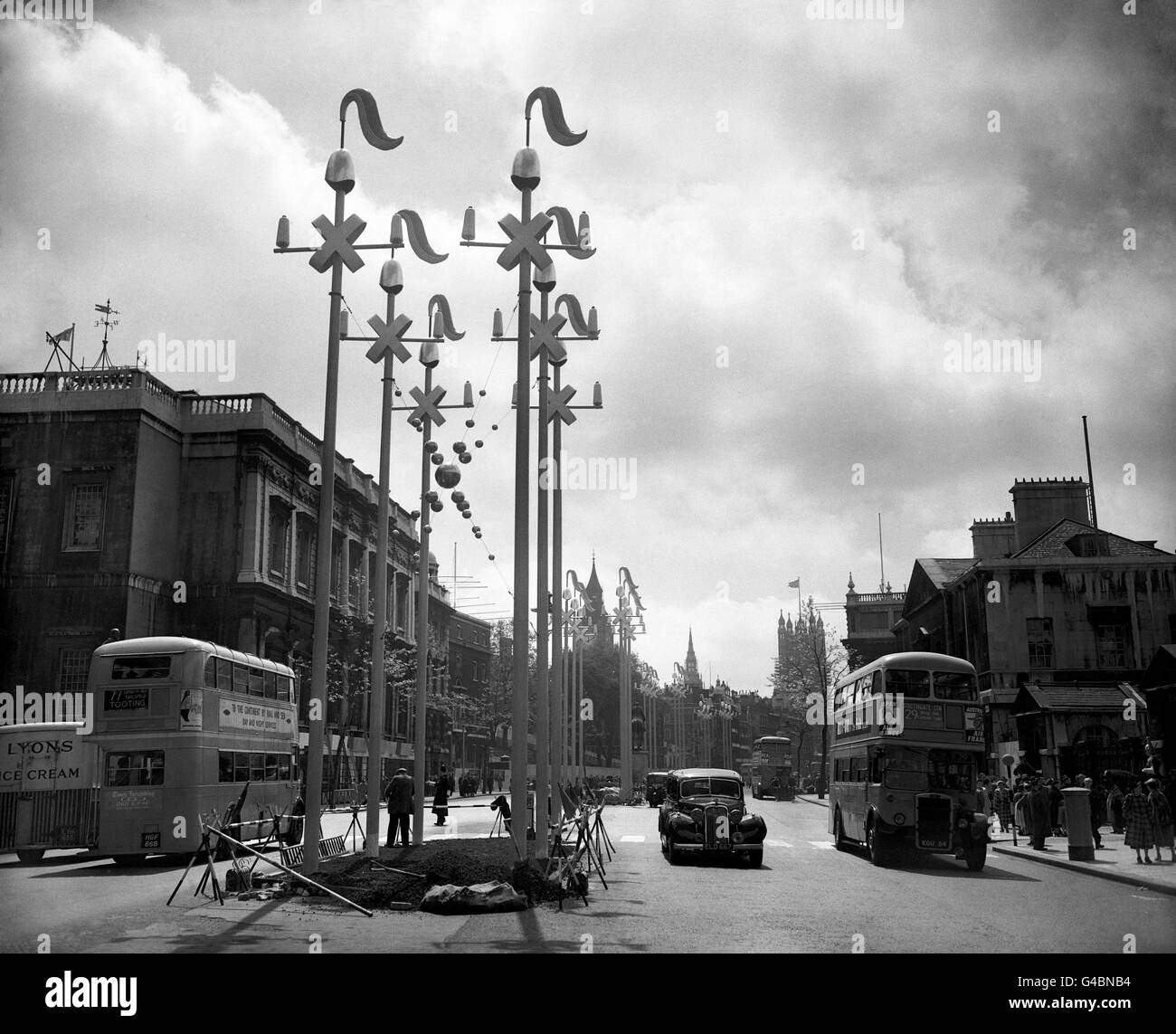 Huge poles surmounted with large replicas of hats worn by the Household ...