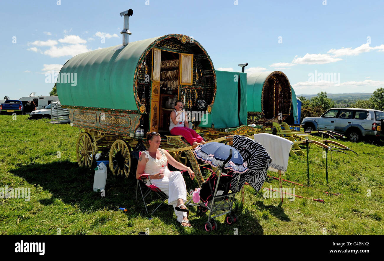 People pictured by a Romany caravan at the Appleby Horse Fair, the ...