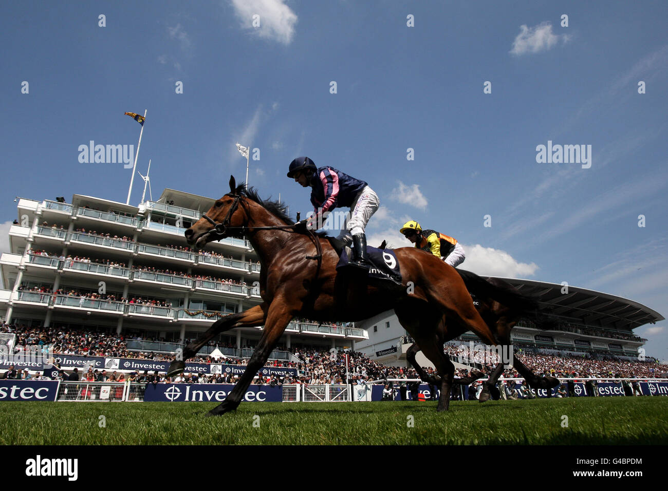 Jockey Chris Catlin on Arabian Star (front) makes his way past the ...
