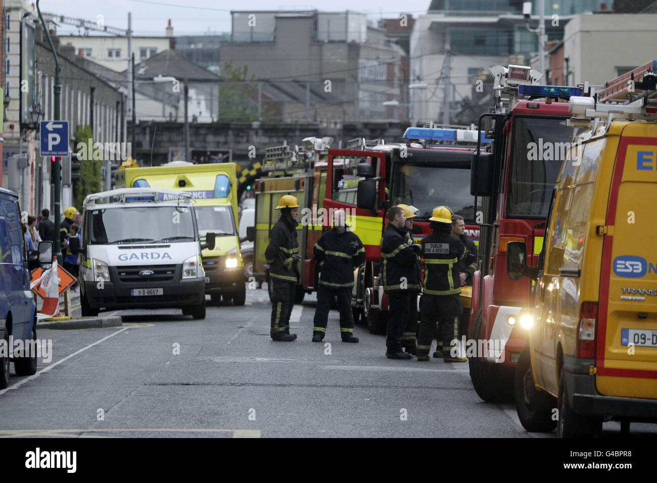 Emergency and utility trucks at the scene of a gas explosion in Erne ...