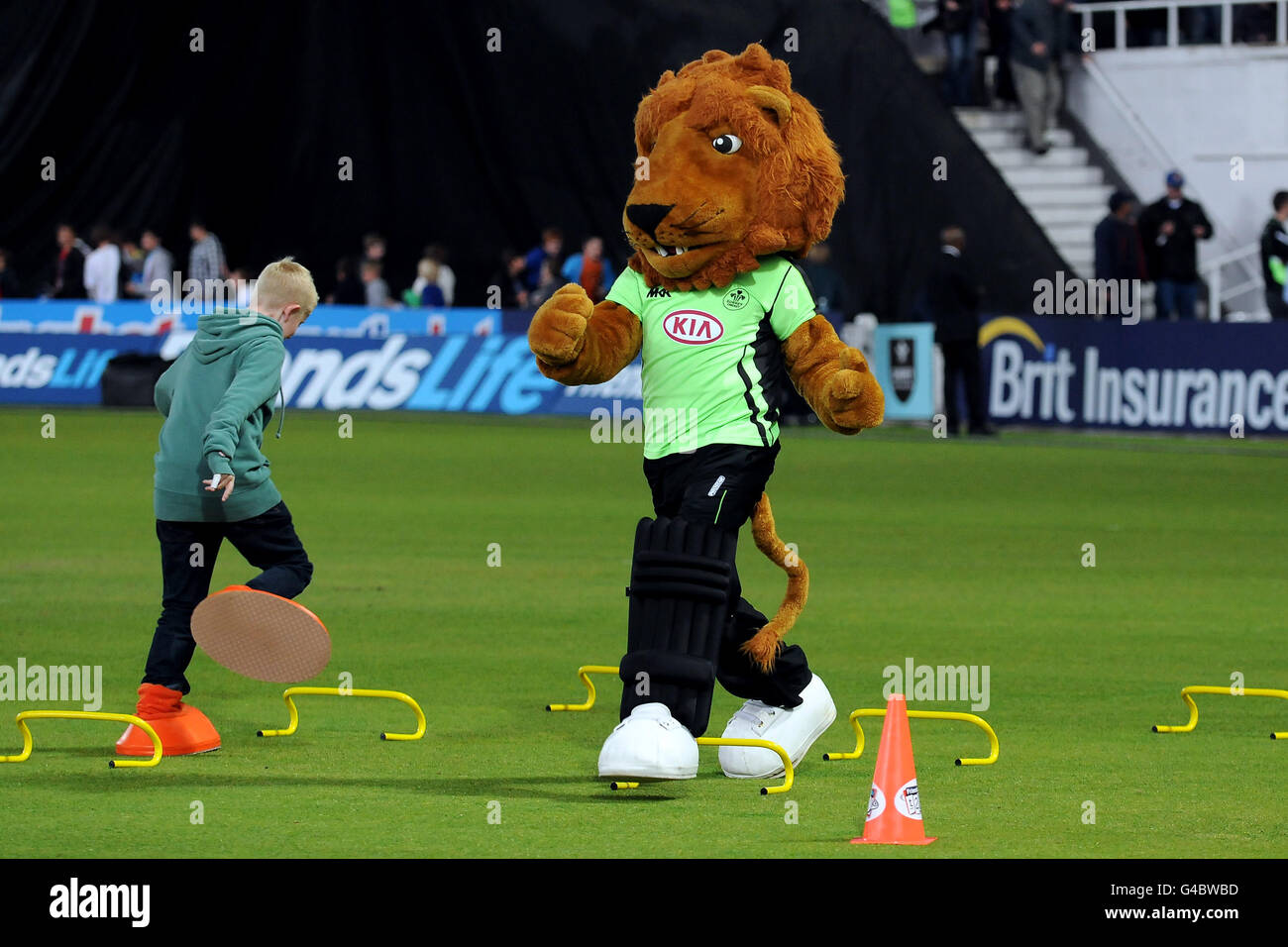 Surrey the lion competes with young fan in pre match contest hi-res ...