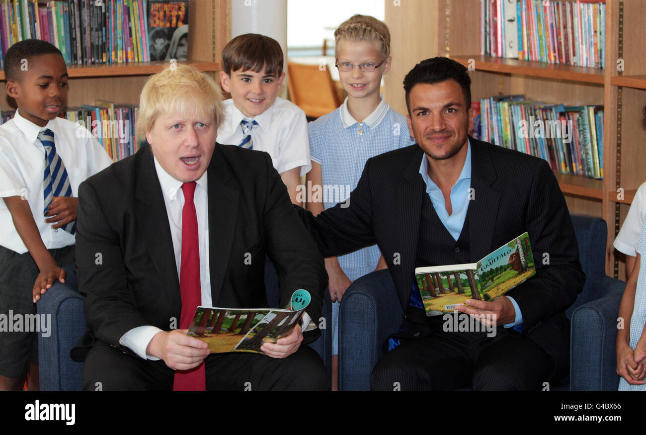 Boris Johnson (left) and Peter Andre read to children at Botwell Green ...