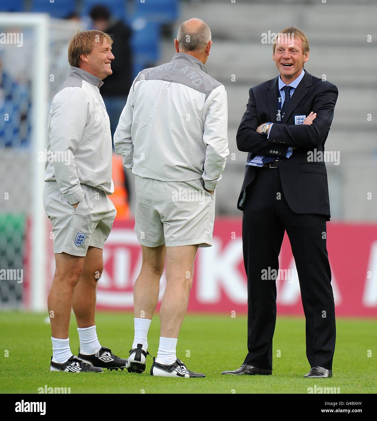 Englands under 21 manager stuart left his assistant steve wigley hi-res ...