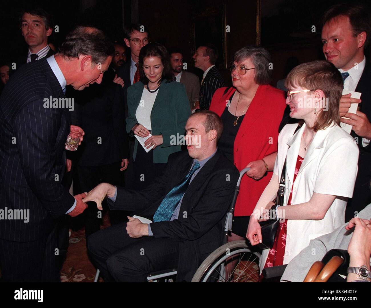 The prince of wales shakes hands with mark hibberd hi-res stock ...