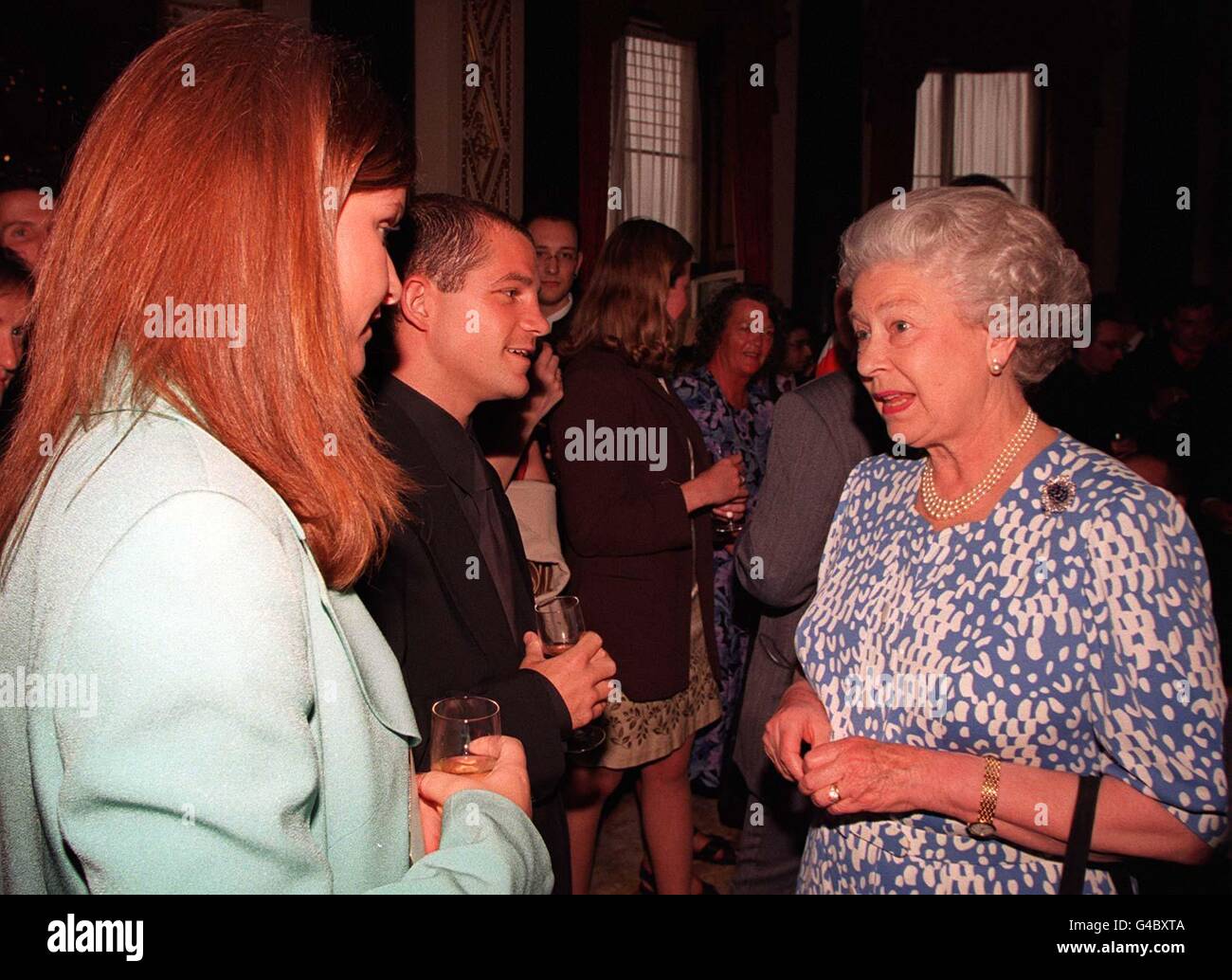 The Queen meets boxer Spencer Oliver, who recently came out of a coma ...