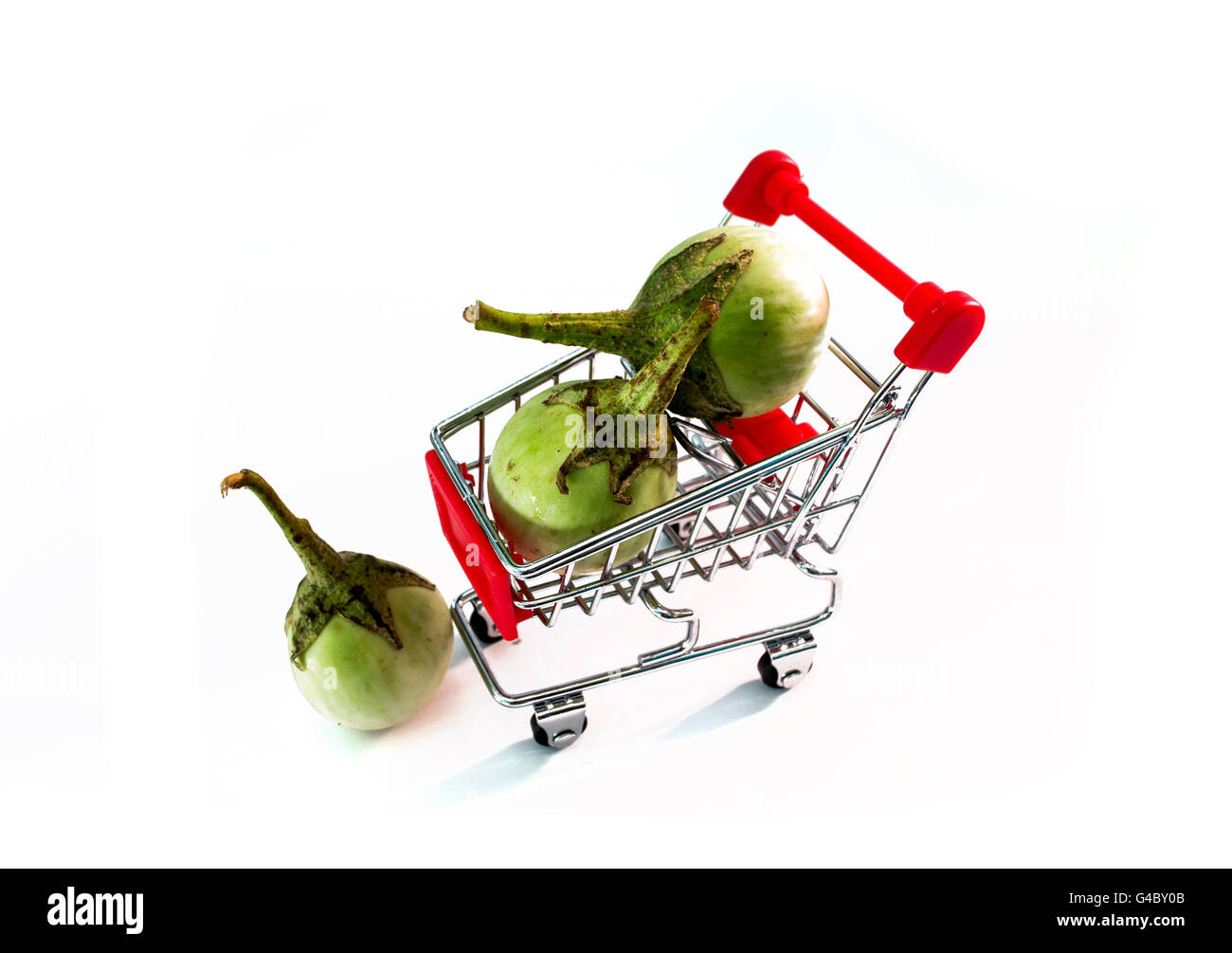 Green Eggplant in a wheelchair on an isolated white background. (Thai ...