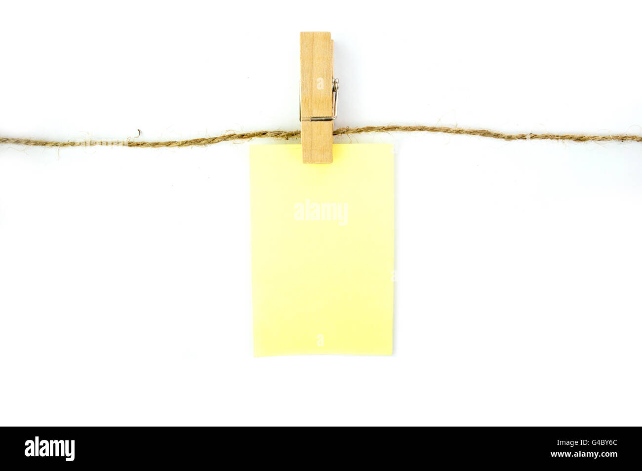 paper notes hanging on rope isolated white background Stock Photo - Alamy