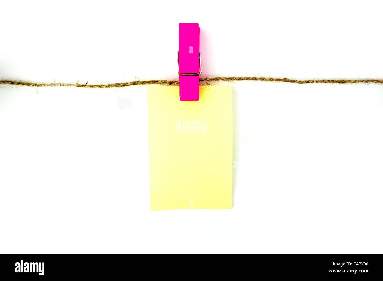 paper notes hanging on rope isolated white background Stock Photo - Alamy