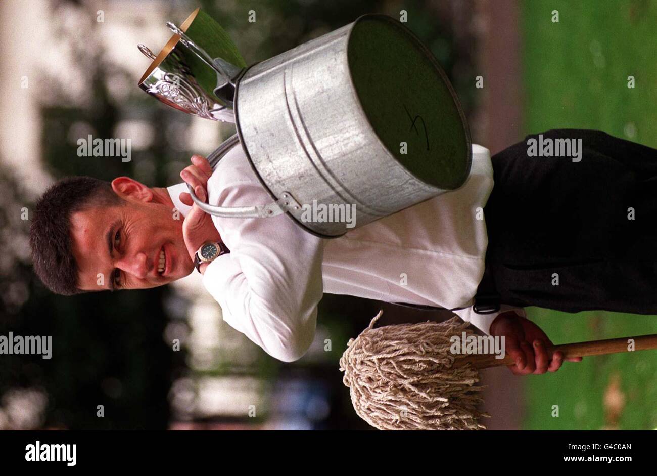 Helicopter engineer, Edward Goodall, with his mop, bucket and silver ...