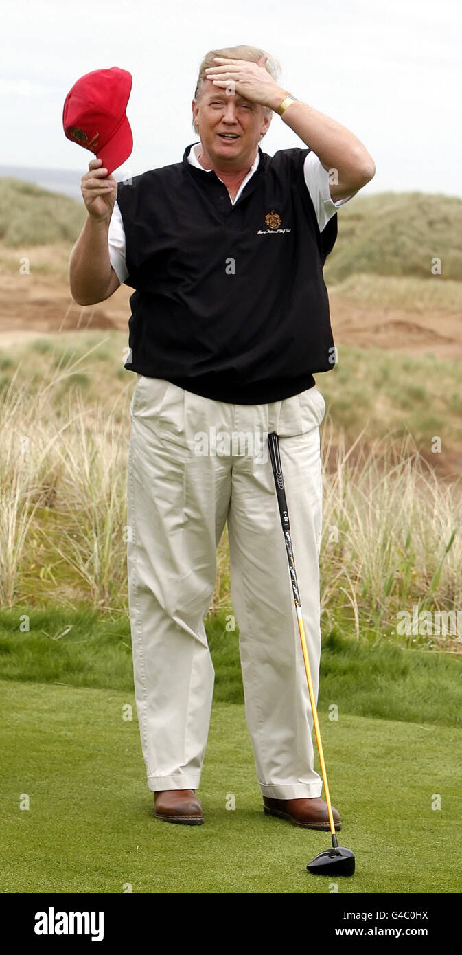 Donald Trump views developments to his luxury golf resort during a ...