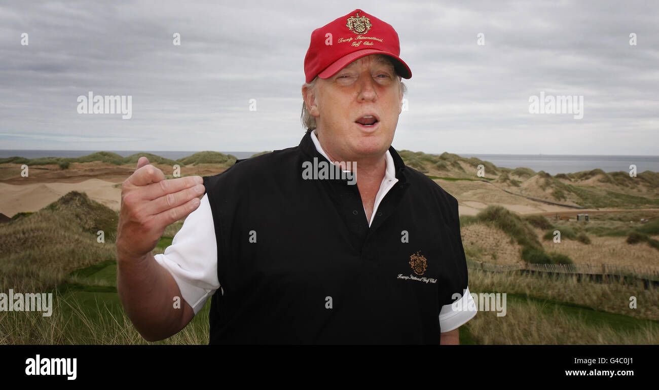 Donald Trump views developments to his luxury golf resort during a ...