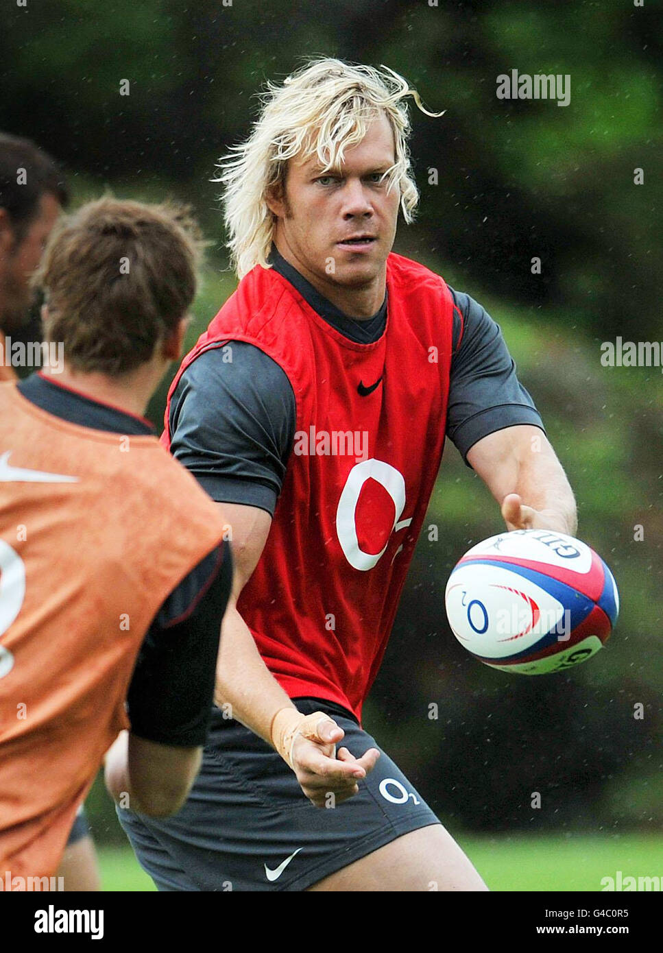 England's Mouritz Botha makes a pass during the training session at ...