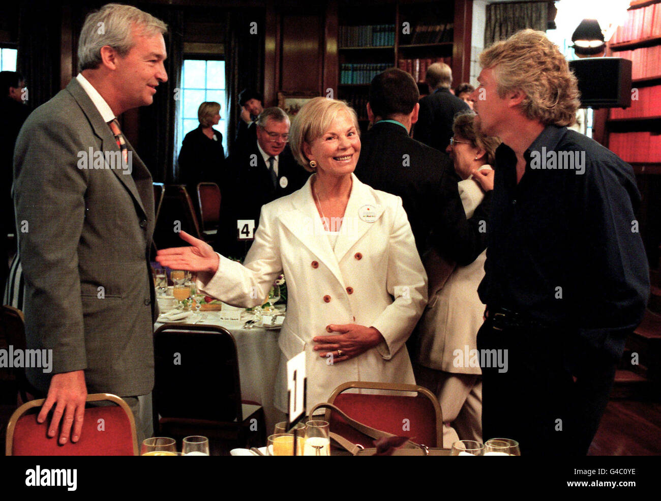 The Duchess of Kent talks with entrepreneur Richard Branson (right) and ...