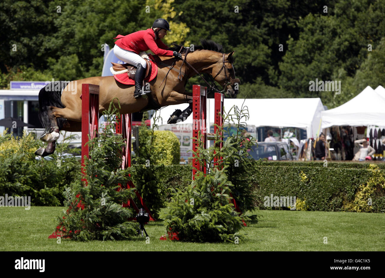 Jo Pay riding Goodman Accobado in the Stoner Jewllers Vase jumping ...