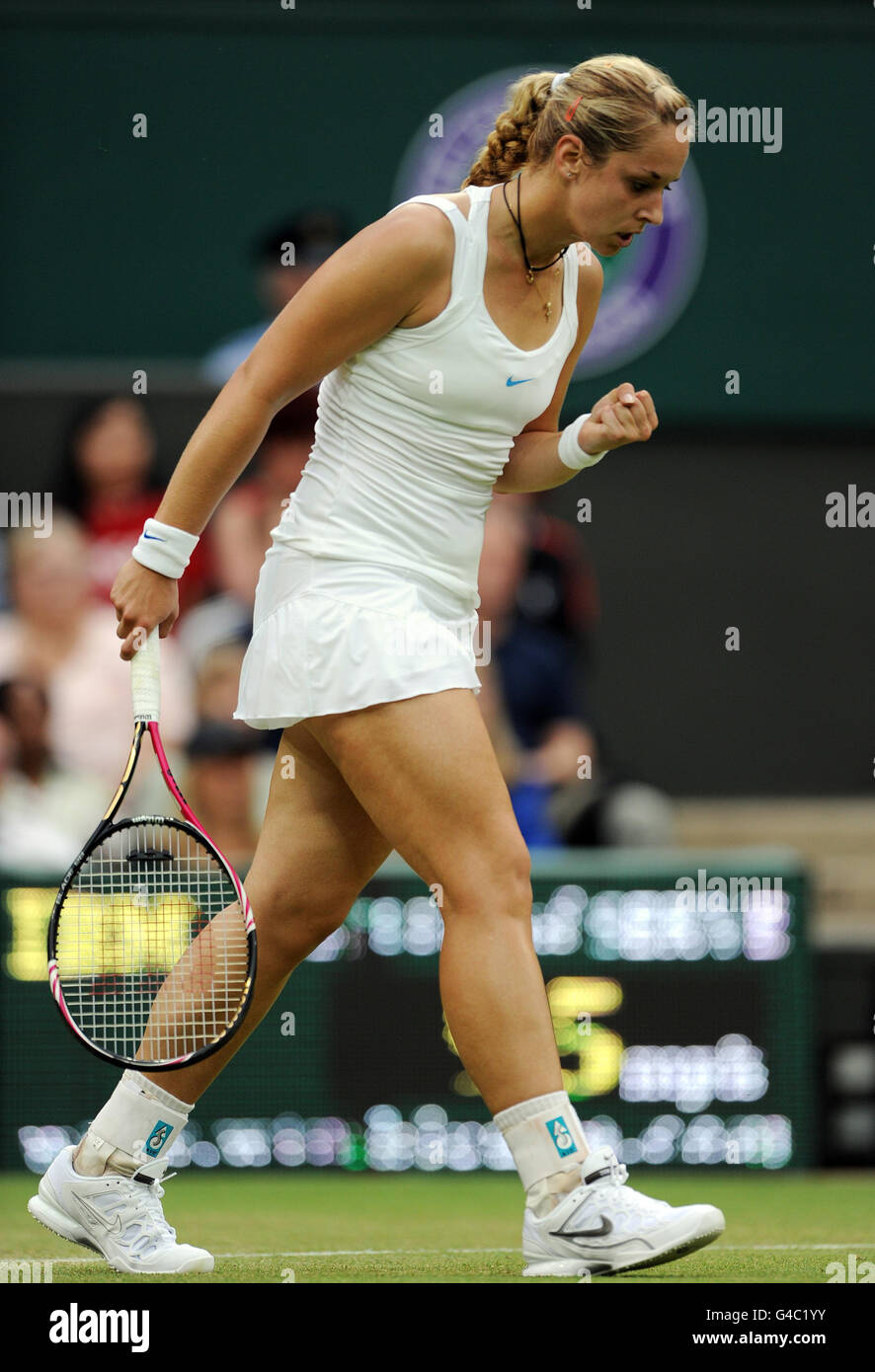 Germany's Sabine Lisicki celebrates against China's Na Li during day ...