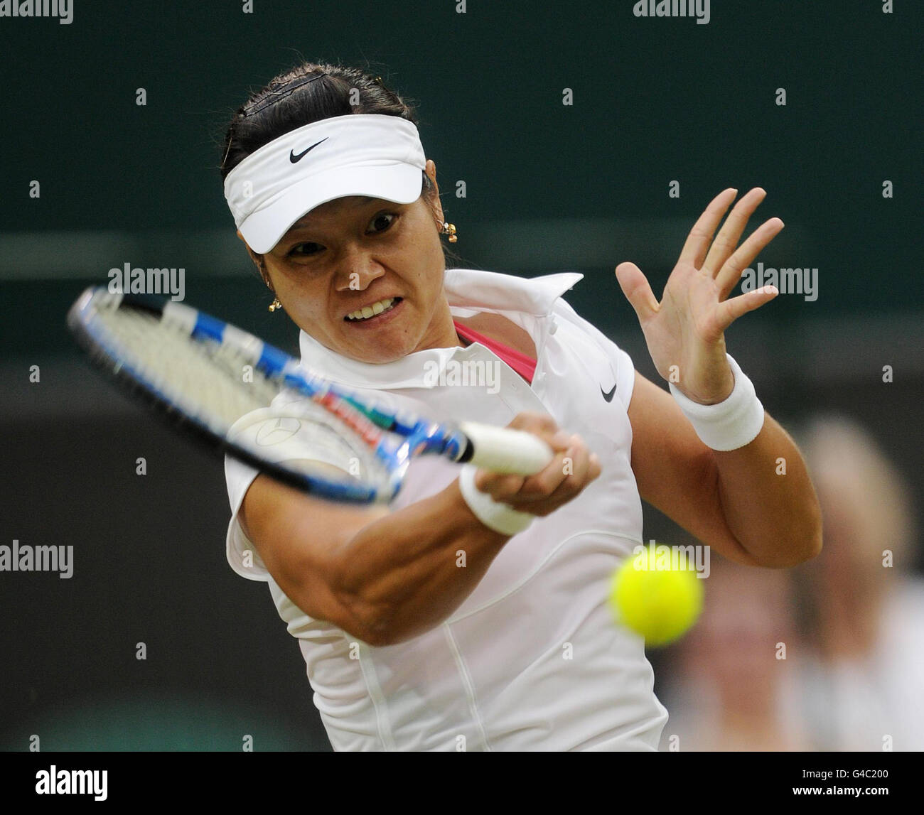 China's Na Li in action against Germany's Sabine Lisicki during day ...