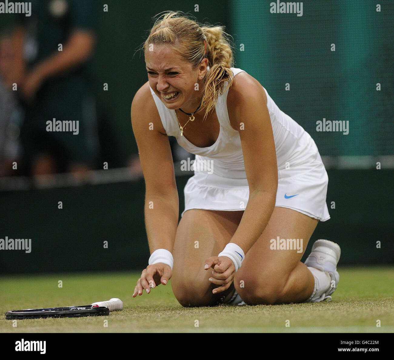 Germany's Sabine Lisicki celebrates defeating China's Na Li during day ...