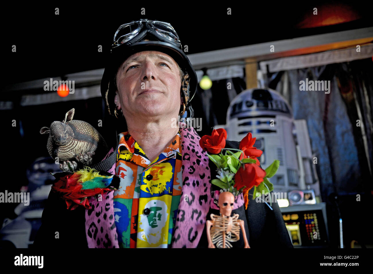 A Glastonbury character, only known as 'Pinball Geoff'', dressed in his ...